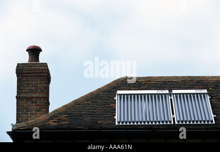 Solar thermal evacuated tubes to heat water on tile roof of large ...