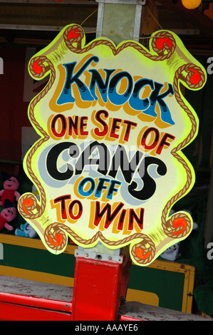 Knock one set of cans off to win sign Stock Photo - Alamy