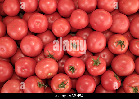 Red juicy tomatoes, close-up, on wooden table, top view Stock Photo - Alamy