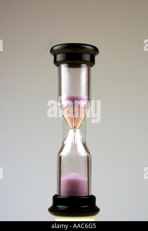 Time To Plan. Sandglass, hourglass or egg timer on wooden table Stock ...
