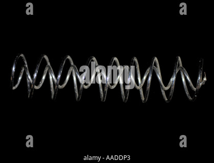 Metal coiled spring isolated on white background, Selective focus Stock ...