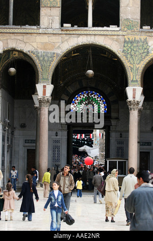 Visitors enter The Umayyad Great Mosque, Old Town Damascus, Syria Stock ...