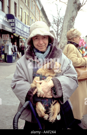 Female pet owner and dog on footpath in forest Stock Photo - Alamy