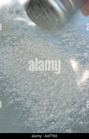 baking flour sprinkled onto work surface Stock Photo - Alamy