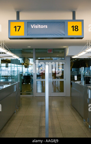 Passport control channels for arriving passengers at Terminal 4 of JFK ...