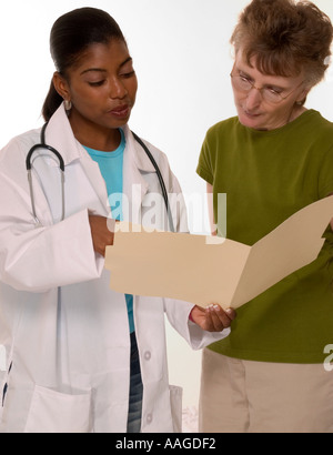 African American general practitioner discusses health results with ...