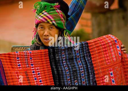 Hill tribe person selling textiles Sapa Vietnam South East Asia Stock ...
