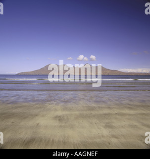 The beautiful Isle of Eigg in Summer with Eigg camping pods overlooking ...
