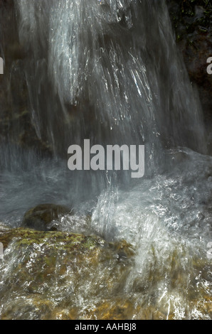 Light reflecting of fast moving stream Stock Photo - Alamy