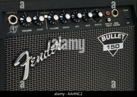 Fender amplifier logo chrome italic script on black cloth Stock Photo ...