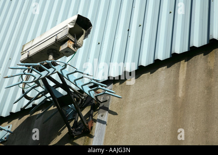 Damaged CCTV cameras on the perimeter wall of the disused Crumlin Road ...