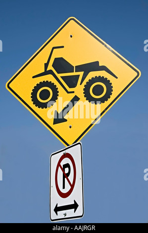 ATV warning Crossing Road sign Stock Photo - Alamy