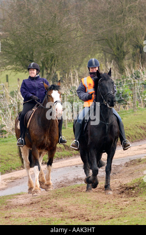 Pony trekkers riding down country lane on a Black Mountains riding loop ...