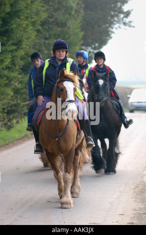 Pony trekkers riding down country lane on a Black Mountains riding loop ...