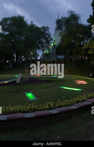 Clock in front of Wat Phnom at night Phnom Penh Cambodia Stock Photo ...