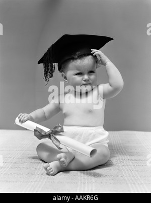 Baby wearing diaper graduation cap holding graduate degree certificate ...