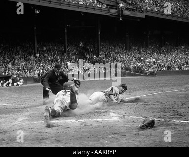 1950s BASEBALL UMPIRE CALLING SLIDING PLAYER OUT STUDIO SHOT Stock ...