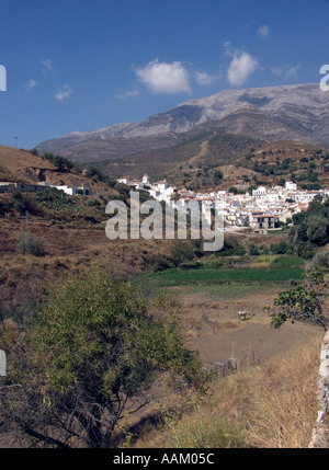 The white town of Sedella nestles in the Sierra Tejeda the Axarquia ...