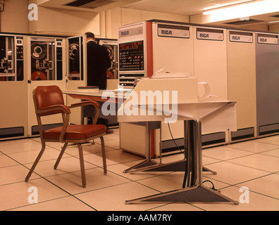 1960s 1970s OFFICE COMPUTER ROOM MAN TECHNICIAN CHANGING TAPE IN ...