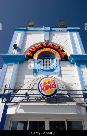 Shops and restaurants on Eastbourne pier Stock Photo - Alamy