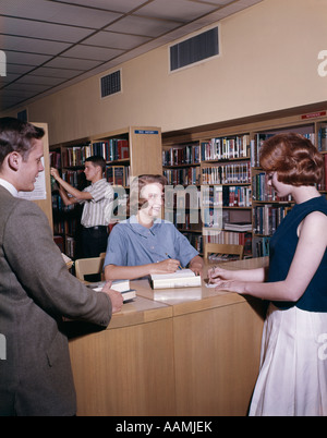 1960s COLLEGE STUDENTS STUDYING IN LIBRARY NOSTALGIA BOY GIRL MAN WOMAN ...