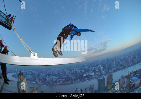 BASE Jump in Shanghai at sunrise Stock Photo - Alamy