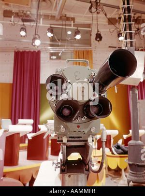 Close up view of vintage retro phone and wall clock on white wall ...