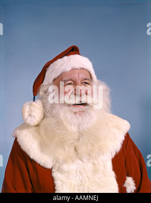 Smiling Santa Claus in magic Christmas night Stock Photo - Alamy