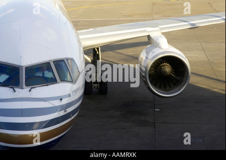 A close up Nose of the Boeing 757 with Pilots at the controls at ...