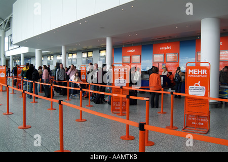 Travellers at the Easyjet airline check in at North terminal, Gatwick ...