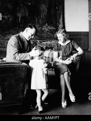 1940's Adolf Hitler and Eva Braun in relaxed mood happily pose for an ...