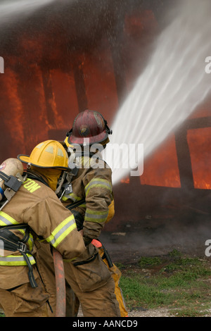 Firefighters Attacking Structure Fire Stock Photo - Alamy