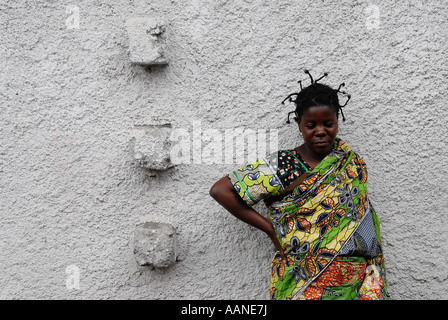 A woman with a traditional threading hairstyle wherein the hair is ...
