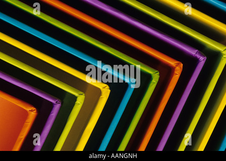 Colorful boxes laid out and evenly spaced creating a colorful pattern ...