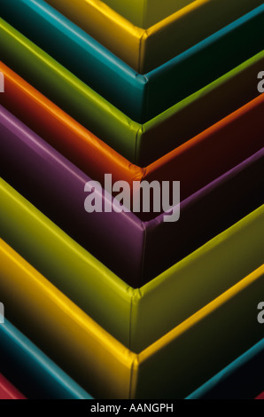 Colorful boxes laid out and evenly spaced creating a colorful pattern ...