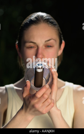 Brown Beclazone inhaler for Asthma prevention with spacer device used ...