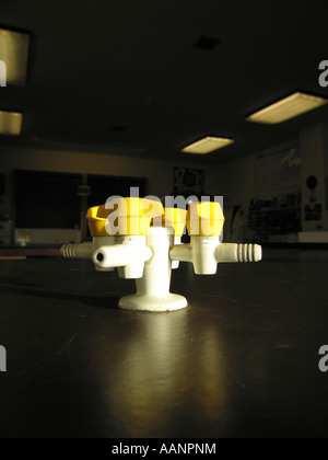 Gas taps on school science department bench Stock Photo - Alamy