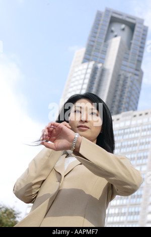 Businesswoman talking over mobile phone Stock Photo - Alamy