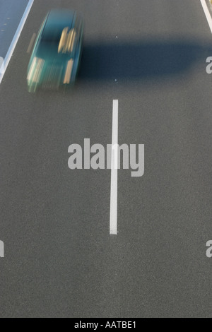 Car going too fast on the highway Stock Photo - Alamy