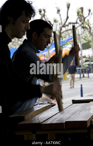 Two Basque men playing the Txalaparta, a Basque traditional percussion ...