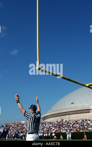 American football on field with goal post in background Stock Photo - Alamy