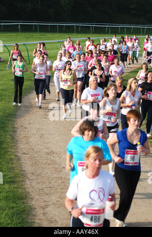 Girls and women running in the Cancer Research Race for Life in Oxford ...