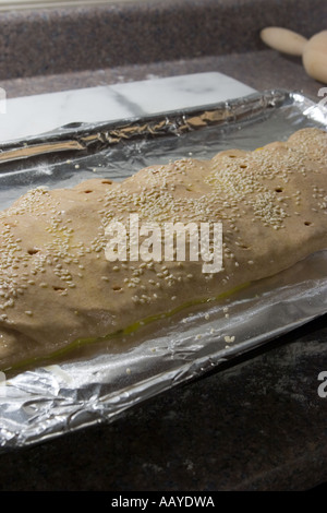 homemade Italian pizza before being cooked in the oven, stuffed with ...