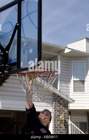 boy dunk basketball Stock Photo - Alamy