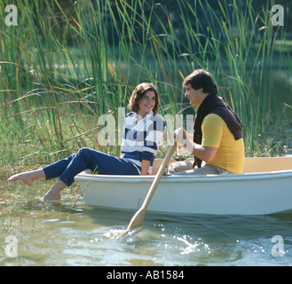 romantic couple enjoying a rowboat ride Stock Photo - Alamy