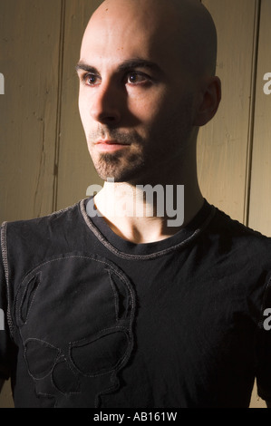 Sinister character illuminated by harsh lighting Stock Photo - Alamy