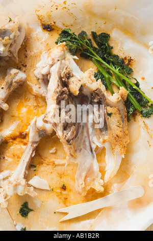 Remains of roast chicken on paper FoodCollection Stock Photo - Alamy