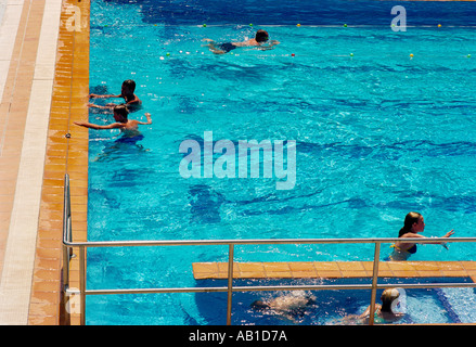 The municipal swimming pool in the hill village of Torrox, on the Costa ...