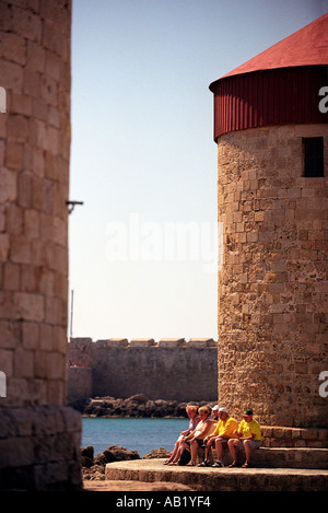 Mandraki Harbour windmills on the Island of Rhodes Greece Stock Photo ...