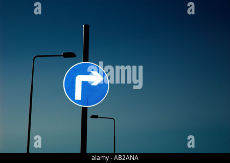 Road sign. Compulsory turn right only Stock Photo - Alamy